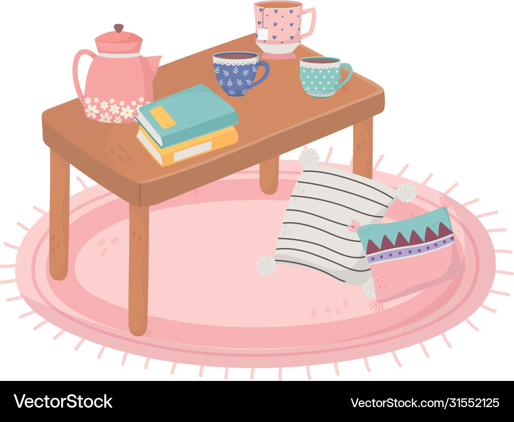 Sweet home table with coffee tea cups kettle books