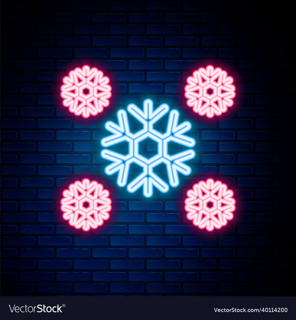 Glowing neon line snow icon isolated on brick wall