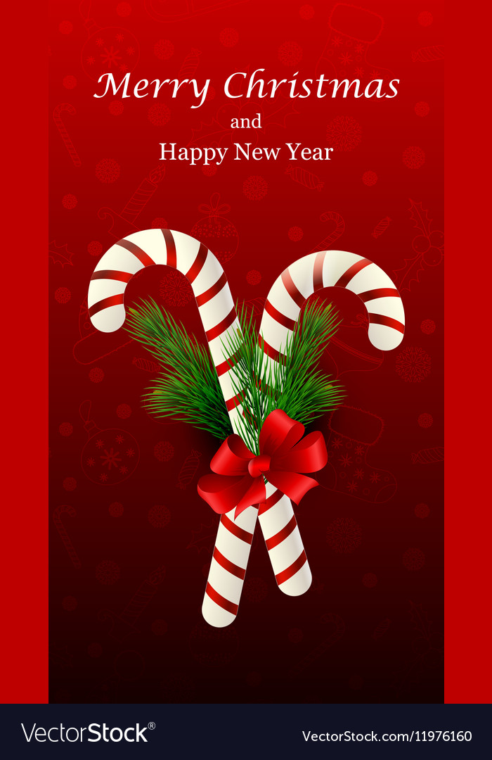 Christmas candy cane decorated with a bow and tree