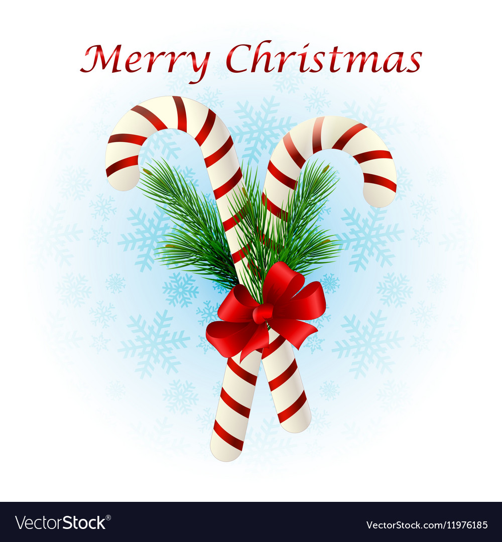 Christmas candy cane decorated with a bow and tree