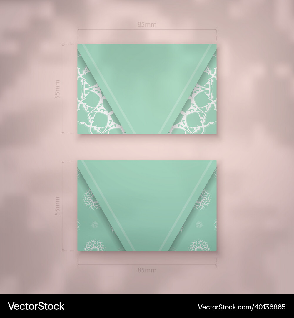 A mint colored business card with luxurious Vector Image