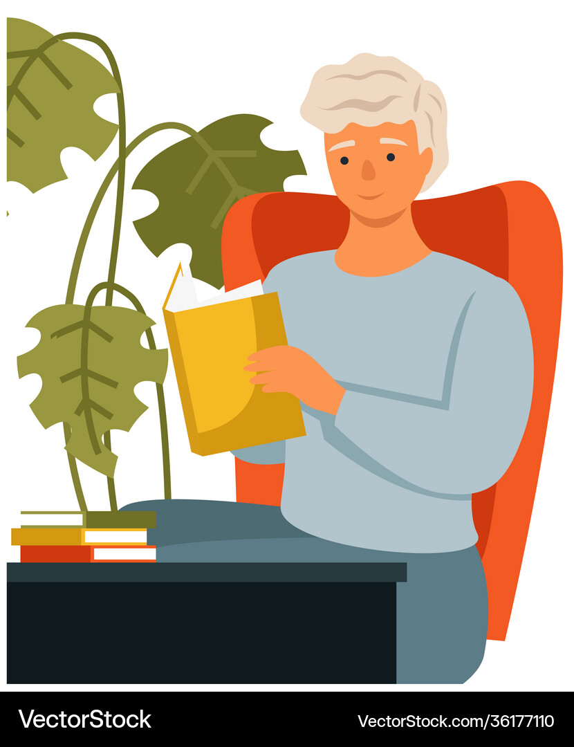 Man is reading book sitting at a table home Vector Image
