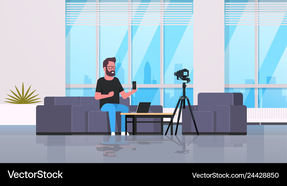 Guy technology blogger recording video on camera Vector Image