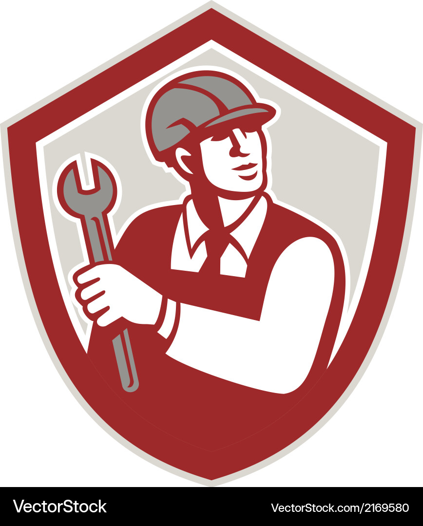 Mechanic holding wrench shield crest retro Vector Image